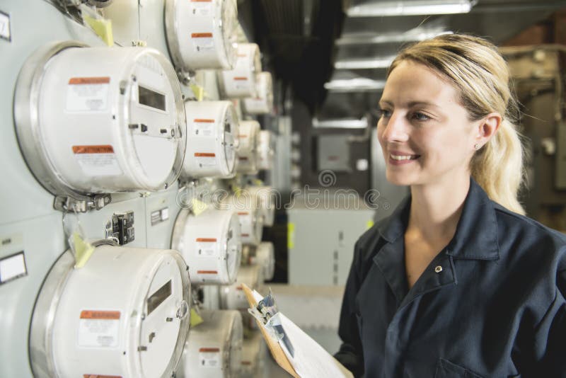 Woman Technician Servicing at Work on Electric Room Stock Image - Image ...