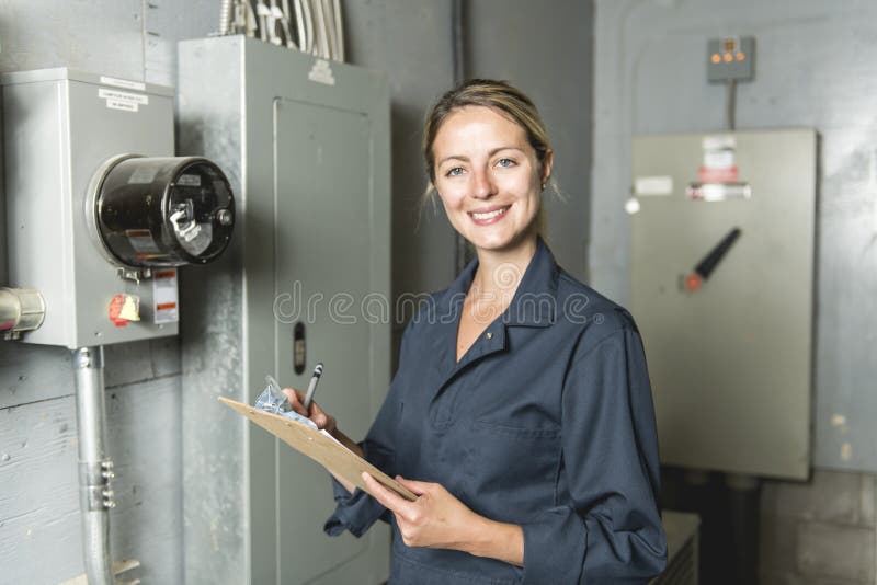 Woman Technician Servicing at Work on Electric Room Stock Photo - Image ...