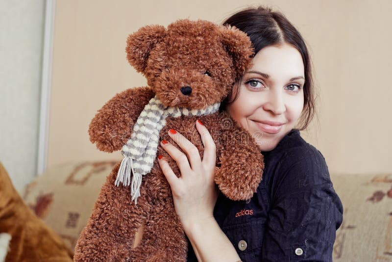 Woman with teddy bear stock image. Image of bear, care - 27334085
