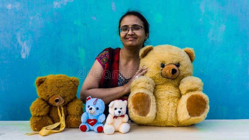Woman with teddy bears stock image. Image of colors - 171233459
