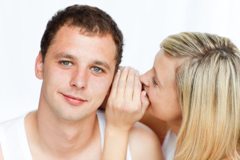 Woman Telling Her Boyfriend Something in the Ear Stock Image - Image of ...
