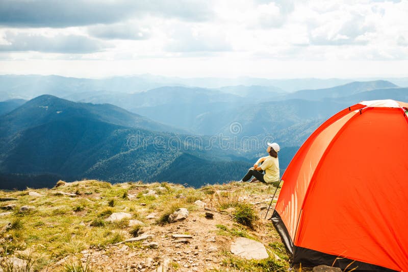 Woman with a Tent on Top of a Mountain Stock Image - Image of adventure ...