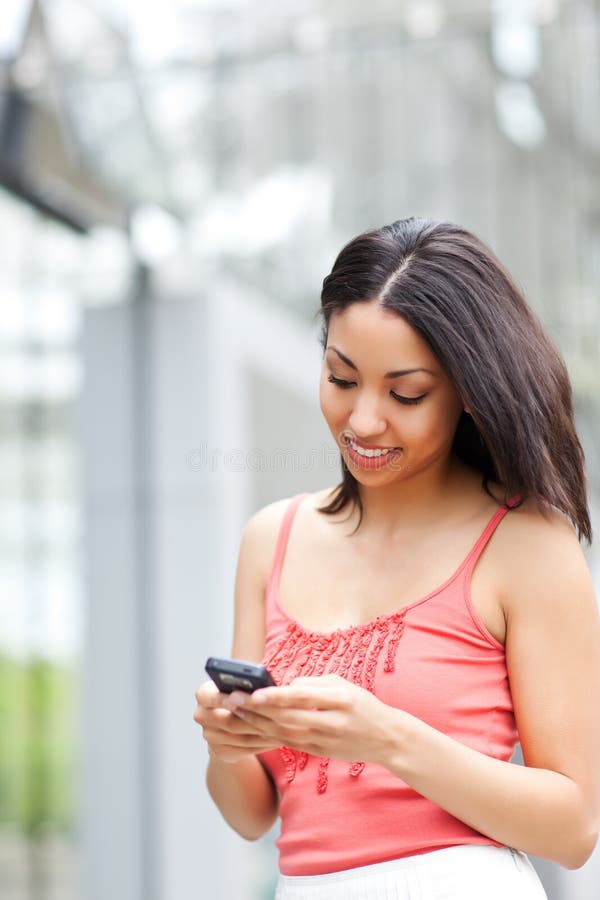 Woman texting stock photo. Image of copyspace, ethnic - 14835926