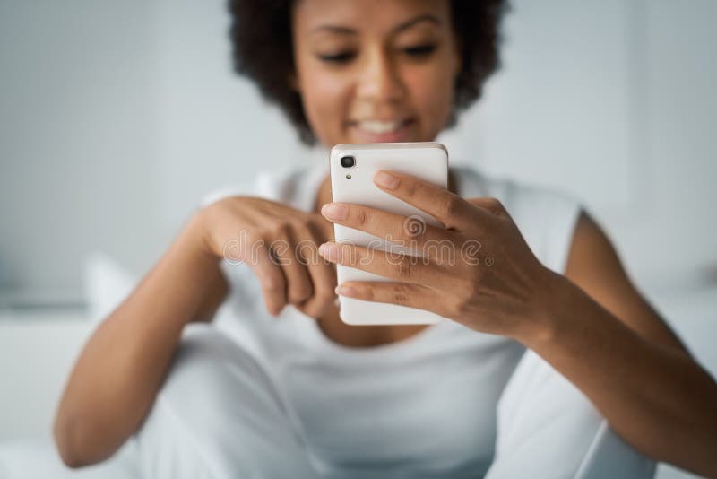 Woman Texting with Her Smartphone Stock Photo - Image of bedroom ... Woman Texting with Her Smartphone Stock Photo - Image of bedroom ...