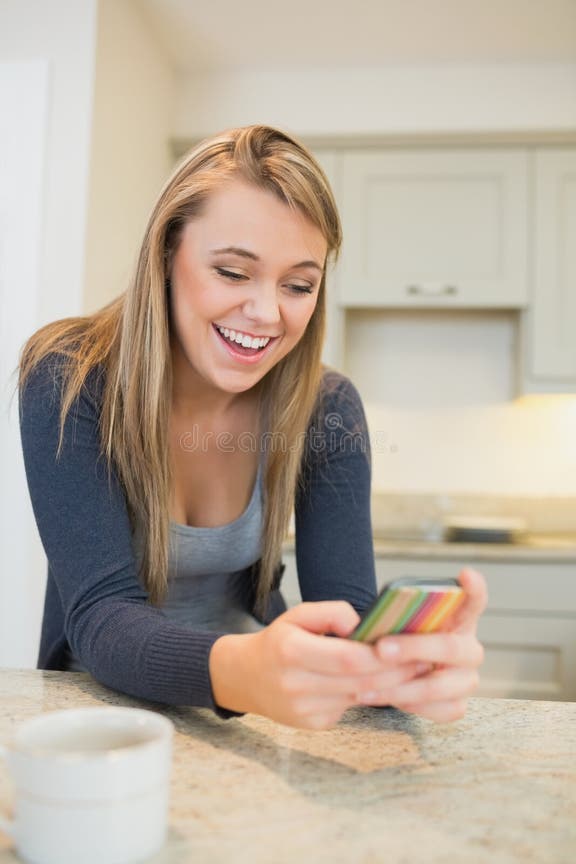 Woman Texting in the Kitchen Stock Image - Image of messaging ...