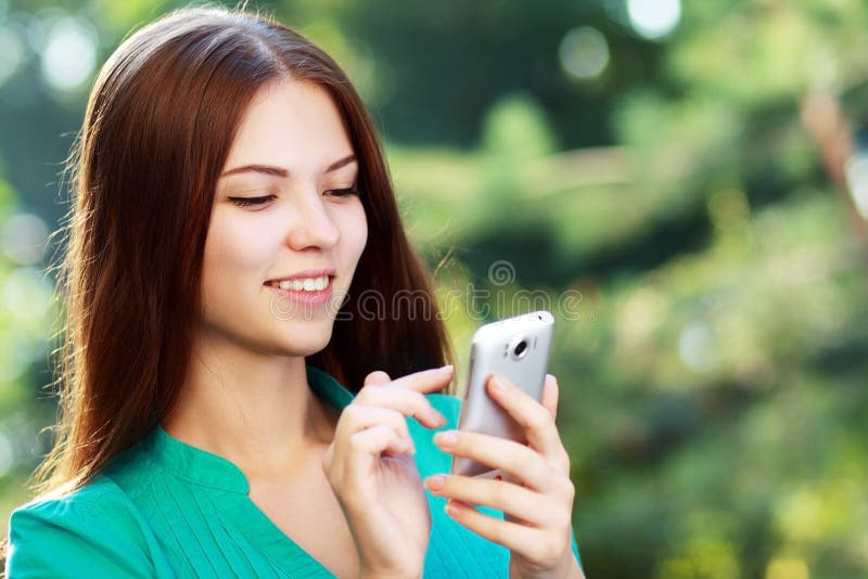 Woman texting messages stock photo. Image of clothing - 33554266