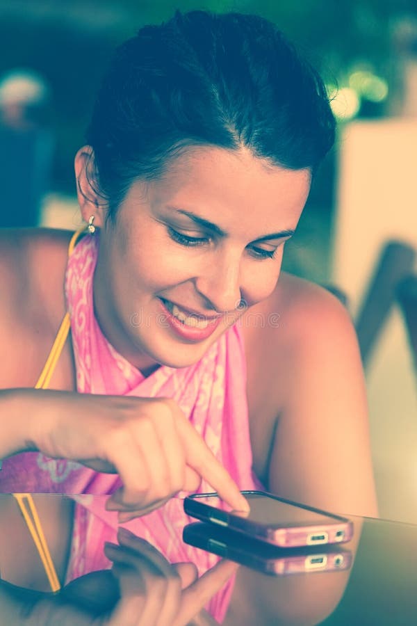 Woman Texting on a Mobile stock image. Image of brunette - 32325719