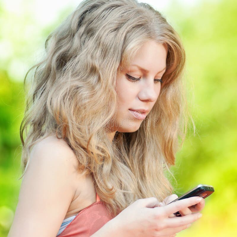Woman Texting on Mobile Phone Stock Photo - Image of happy, green: 21719726