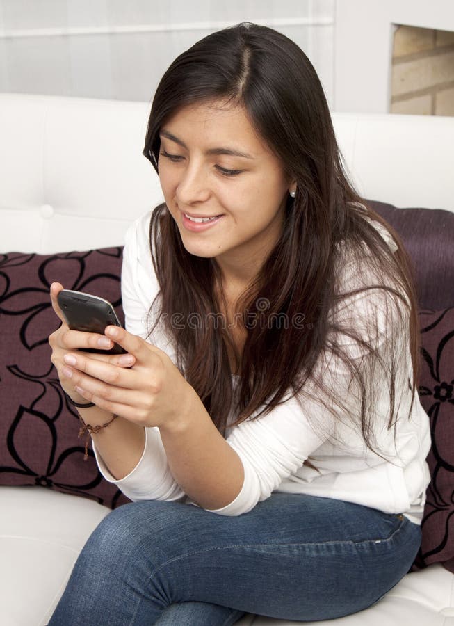 Woman Texting Using A Mobile Phone In The Home Stock Image - Image of ...