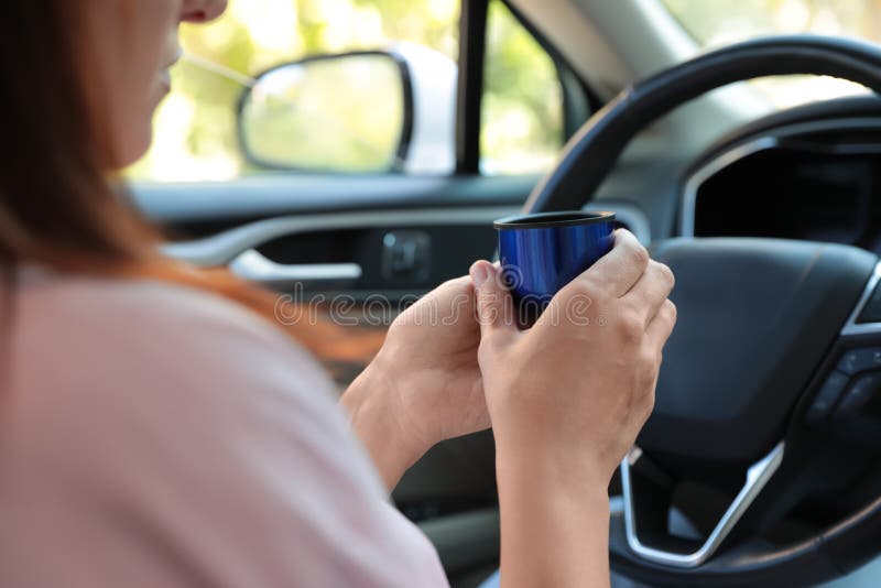 Woman with Thermos Cap Driving Car, Closeup Stock Image - Image of ...