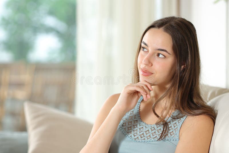 Woman is Thinking and Looking at Side at Home Stock Image - Image of ...
