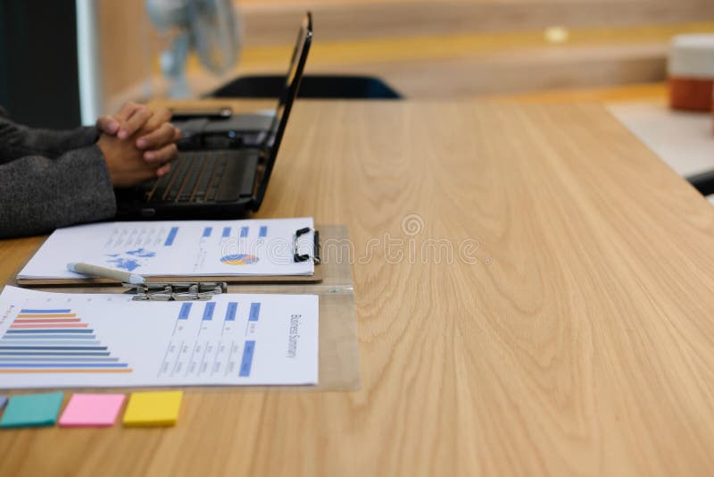 Woman Thinking, Working with Graph Chart Document at Workplace Stock ...