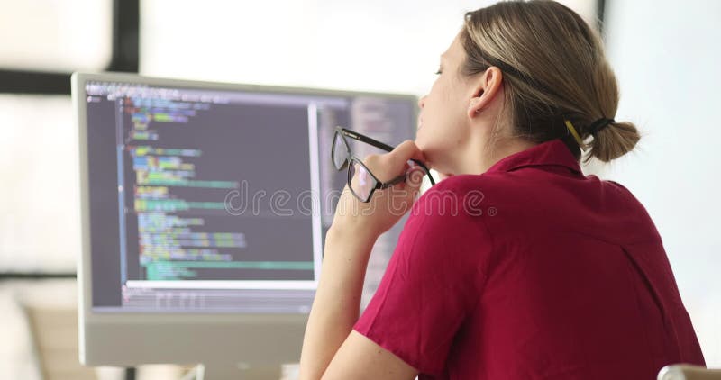 A Woman Thinks Sitting in Front Computer Screen, Close-up Stock Footage ...