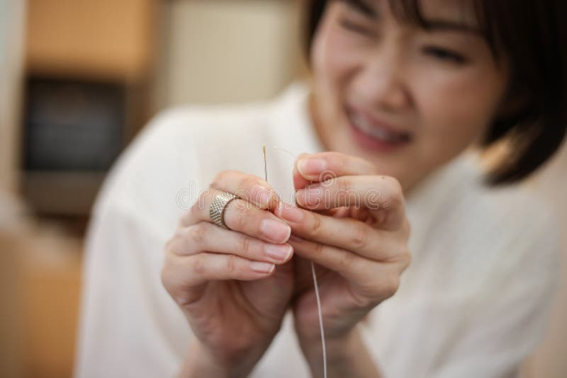 109 Old Woman Threading Needle Stock Photos - Free & Royalty-Free Stock ...
