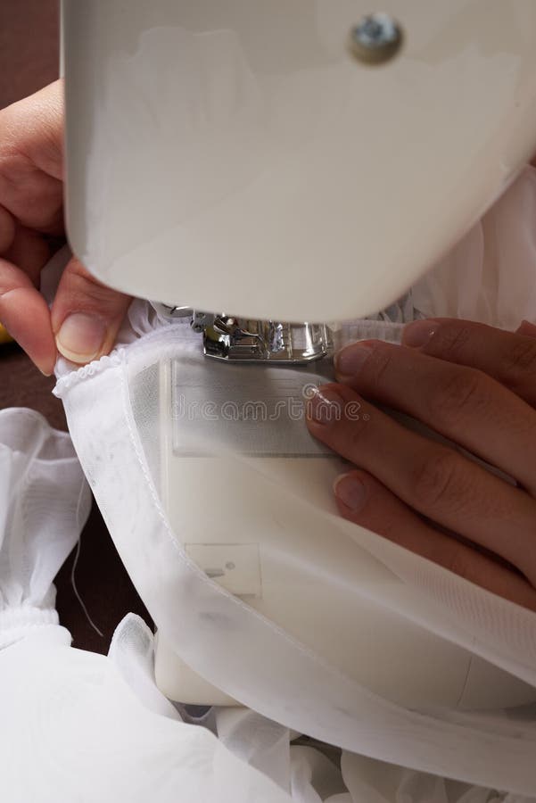 Woman Threading on Sewing Machine Stock Photo - Image of close, atelier ...