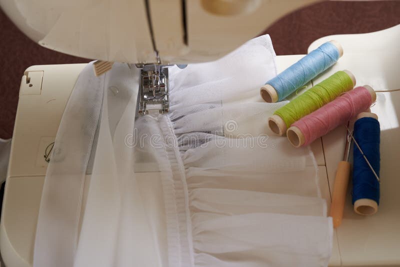 Woman Threading on Sewing Machine Stock Image - Image of needle, design ...