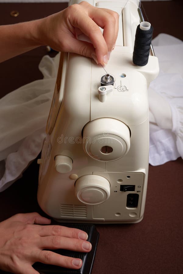 Woman Threading on Sewing Machine Stock Image - Image of industry ...