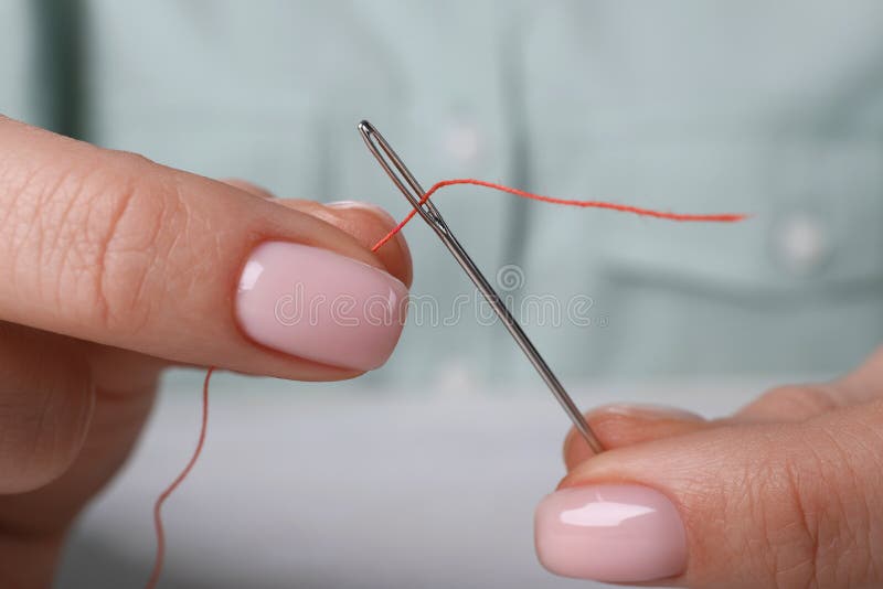 Woman Threading Sewing Needle at Table, Closeup Stock Image - Image of ...