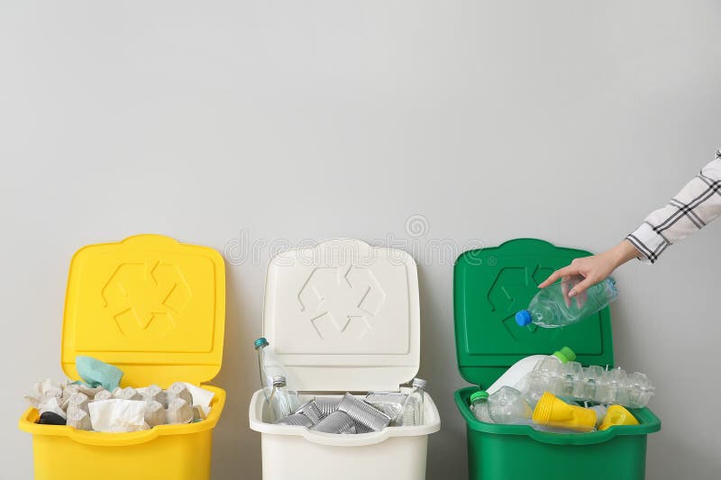 Woman Throwing Garbage into Container. Recycling Concept Stock Image ...