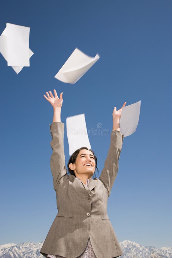 Woman throwing paper stock image. Image of mountain, business - 62807595
