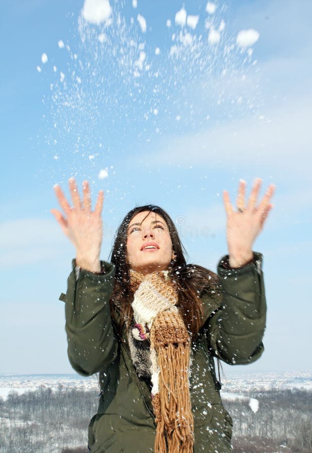 Woman throwing snow stock photo. Image of scenery, cold - 8186818