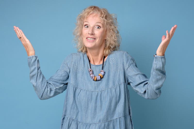 Woman Throws Up Hands Shrugging Her Shoulders Being Unsure Having Some