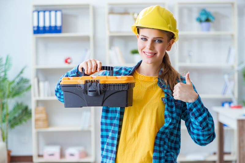 The Woman with Toolkit in Workshop Stock Photo - Image of contractor ...