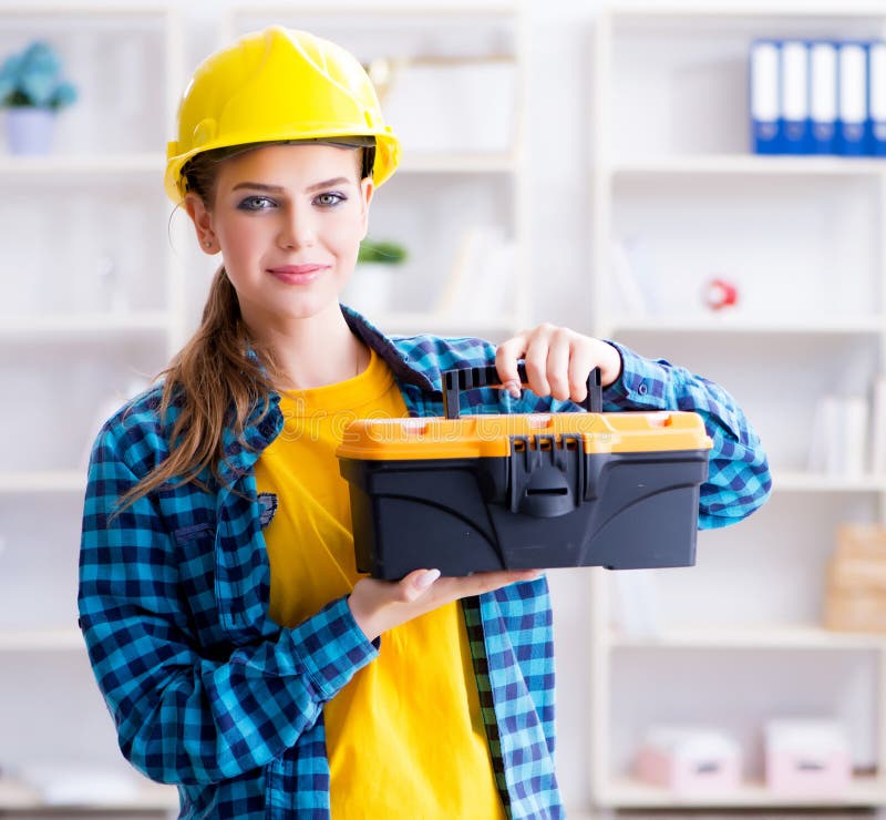 Woman with Toolkit in Workshop Stock Photo - Image of interior ...