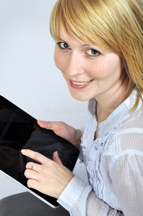 Woman with Touch Pad Device Stock Image - Image of single, hair: 24370139