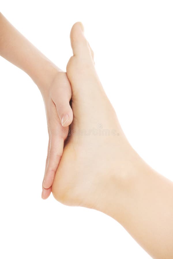 Woman touching her foot stock image. Image of cosmetics - 48683017