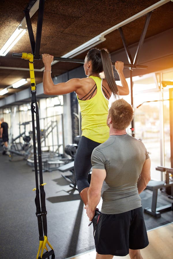 Woman Trained in Gym with Coach- Back View Stock Image - Image of ...