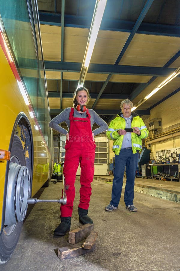Woman, Trainee, Working in the Bus Workshop Stock Photo - Image of ...