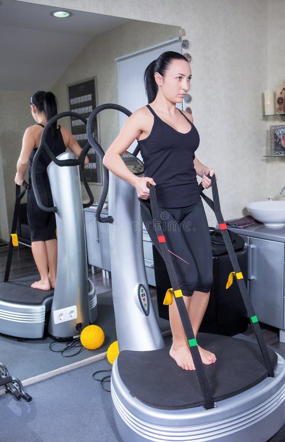 Woman Training on Elliptical Trainer Stock Image - Image of learning ...