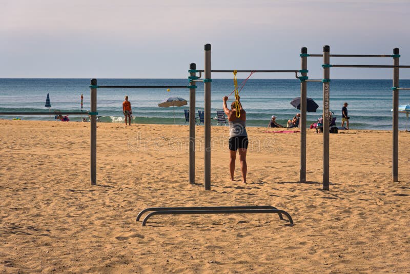 Woman Training in Gym on Beach Editorial Photo - Image of coastline ...