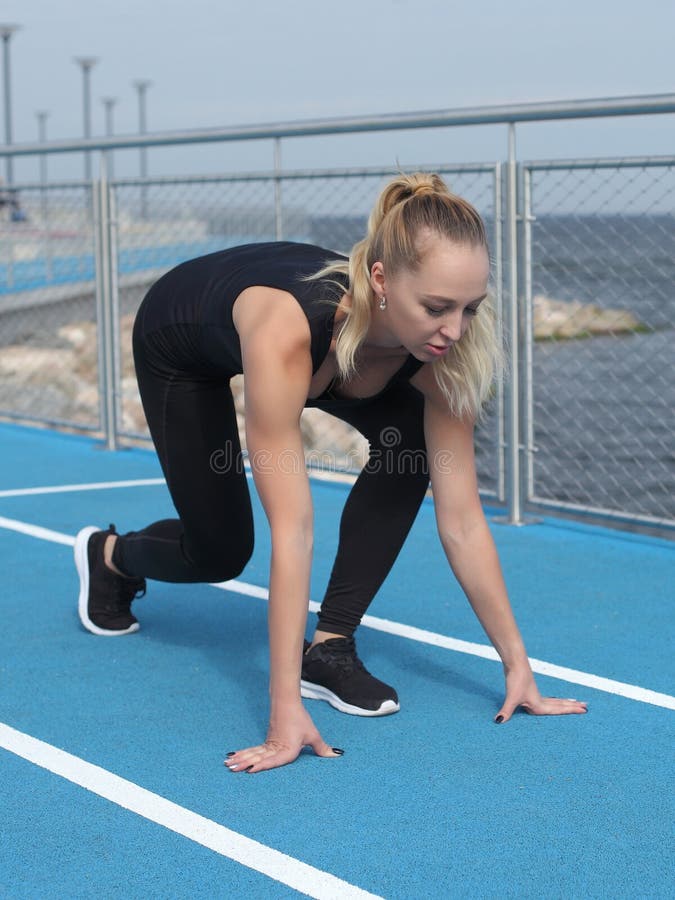 Woman Training Start Up Grid for Running Stock Image - Image of active ...