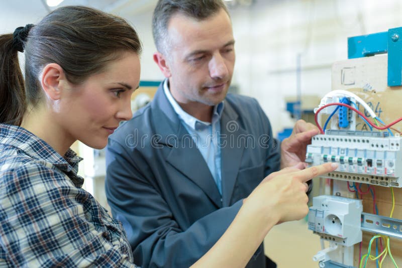 Woman Training To Learn How To Measure Electrical Current Stock Photo ...