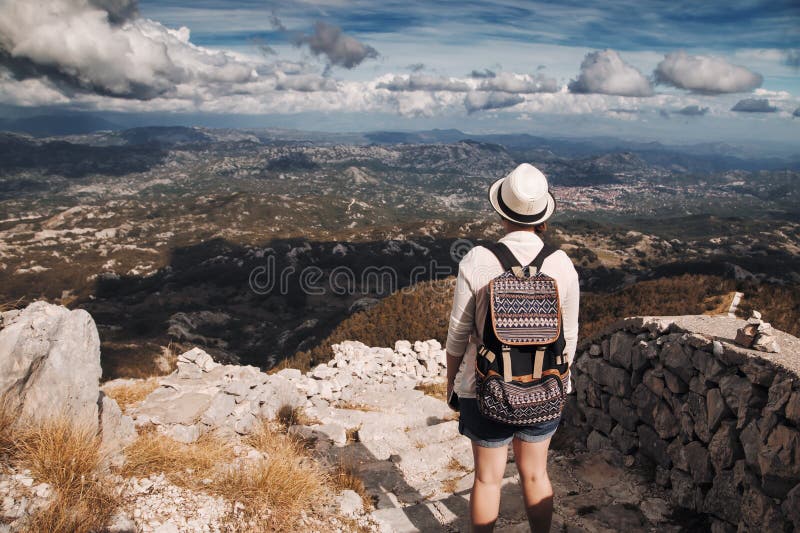Woman Traveler with Backpack Standing on the High Mountain Stock Photo ...