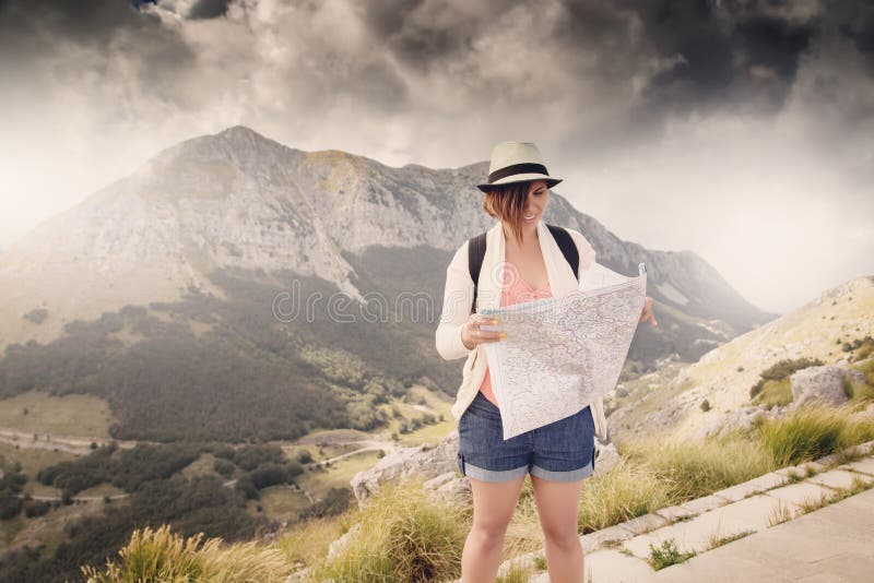 Woman Traveler with Map on High Mountains Stock Photo - Image of ...
