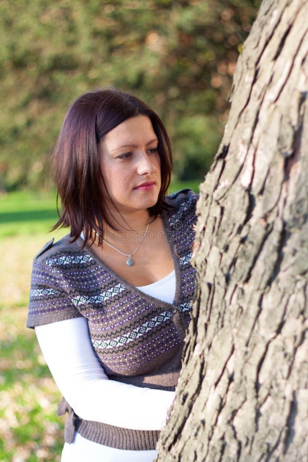 Woman and tree stock image. Image of portrait, sunlight - 45661263