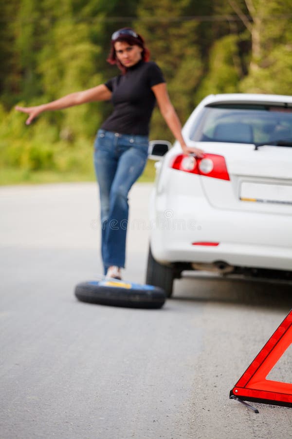 Woman Trying To Catch Someone Who May Help Her. Stock Photo - Image of ...