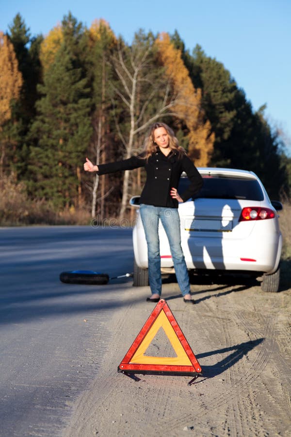 Woman Trying To Catch Someone Who May Help Her. Stock Photo - Image of ...