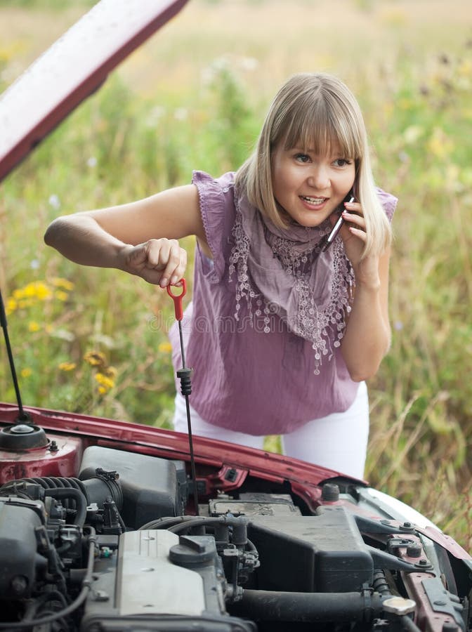 301 Woman Trying To Fix Car Stock Photos - Free & Royalty-Free Stock ...