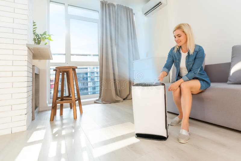 Woman Turn on Air Humidifier Stock Photo - Image of asthma, health ...