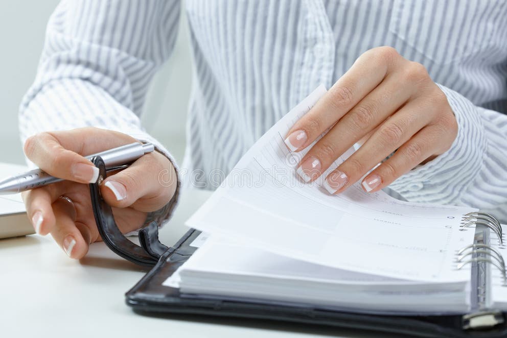 Woman Turning Notebook Page Stock Image - Image of clean, desk: 10628927