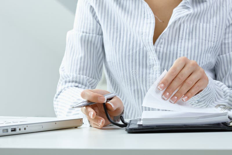 Woman Turning Notebook Page Stock Image - Image of horizontal, bright ...