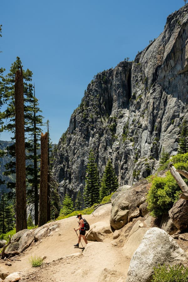 Woman Turns the Corner of a Switchback on the Way Down from Yosemite ...