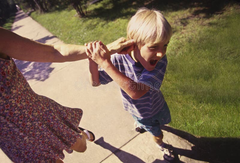 Ear Pull Punishment Stock Photos - Free & Royalty-Free Stock Photos ...