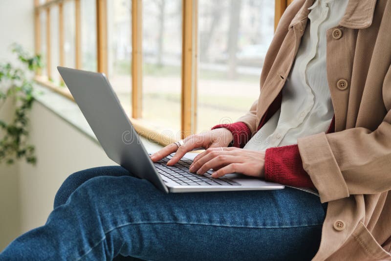 Woman typing on computer stock image. Image of internet - 220265975