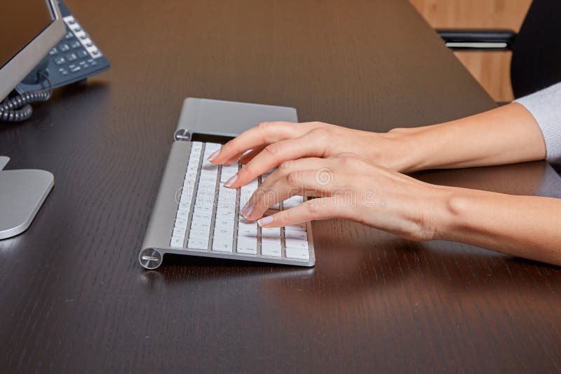 Woman Typing on a Computer Keyboard Stock Image - Image of female ...