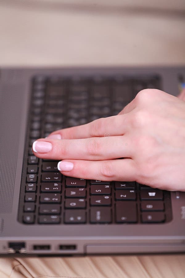 Woman typing on keyboard editorial stock photo. Image of information ...